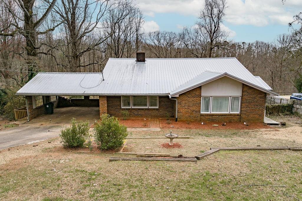 Roam | Buy 2169 Skyline Dr, Gainesville, GA with a 4% mortgage included.